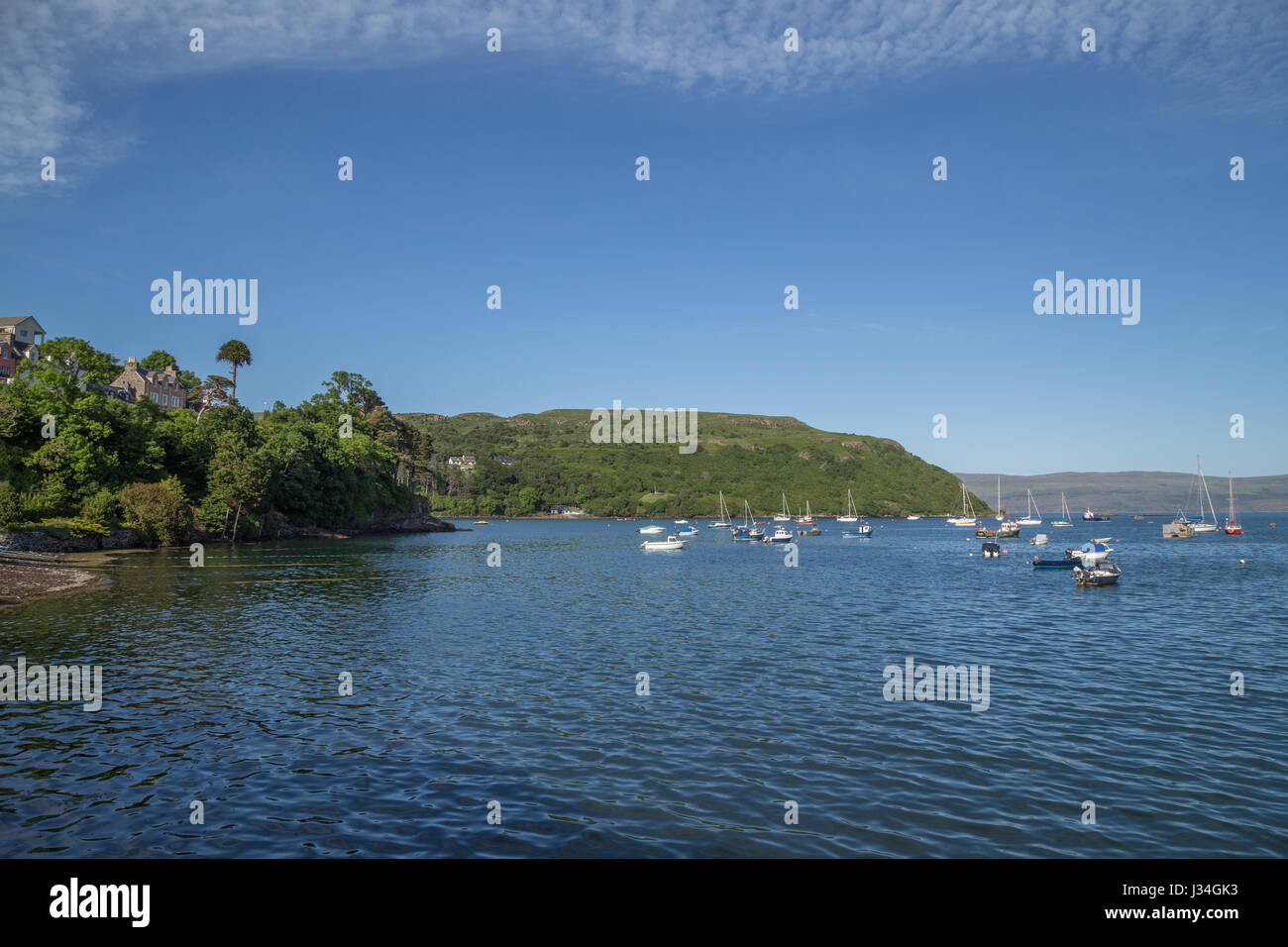 Boats in Portree harbour on the Isle of Skye, one of the Inner Hebrides ...