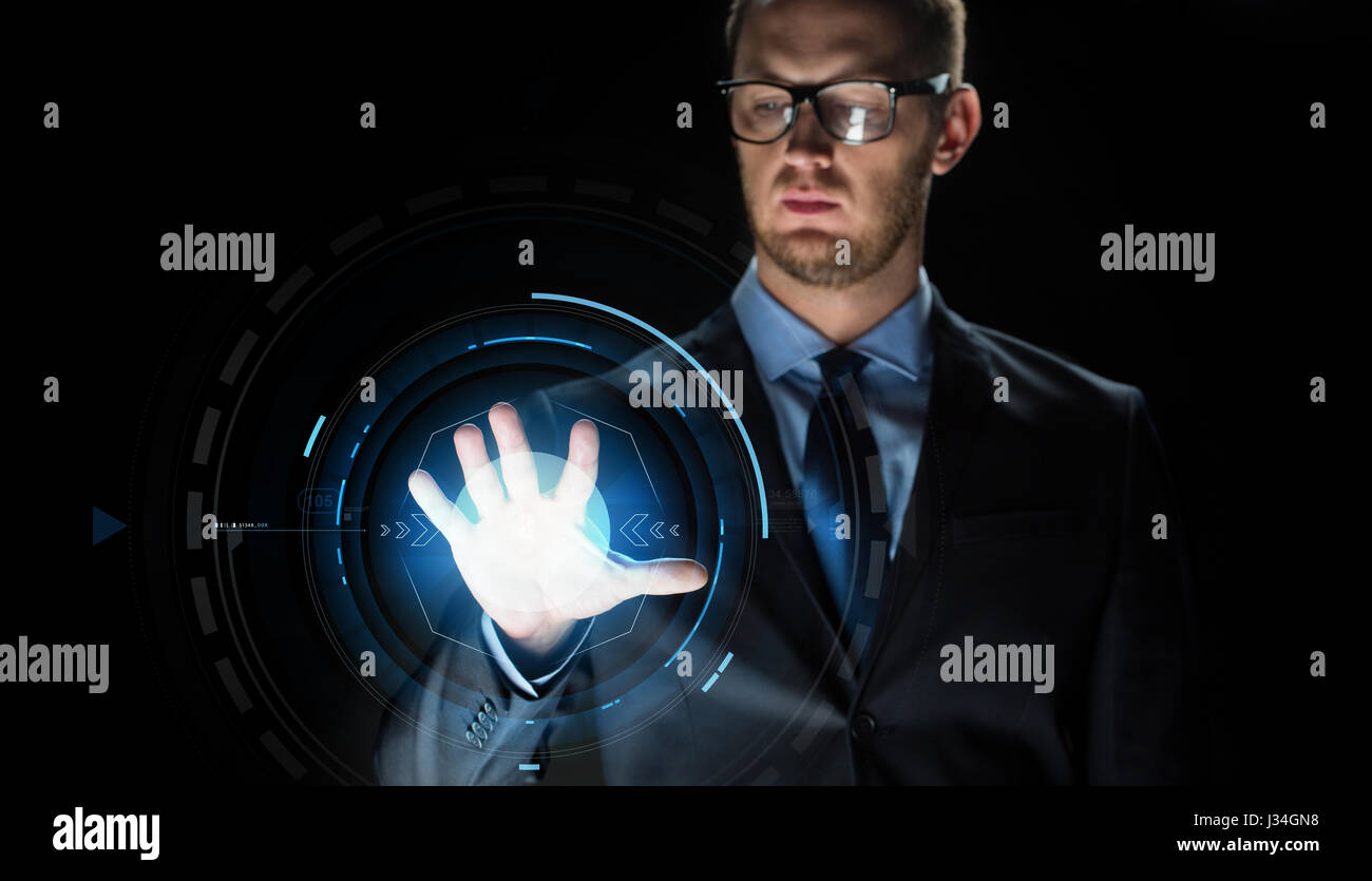 businessman touching virtual screen projection Stock Photo - Alamy