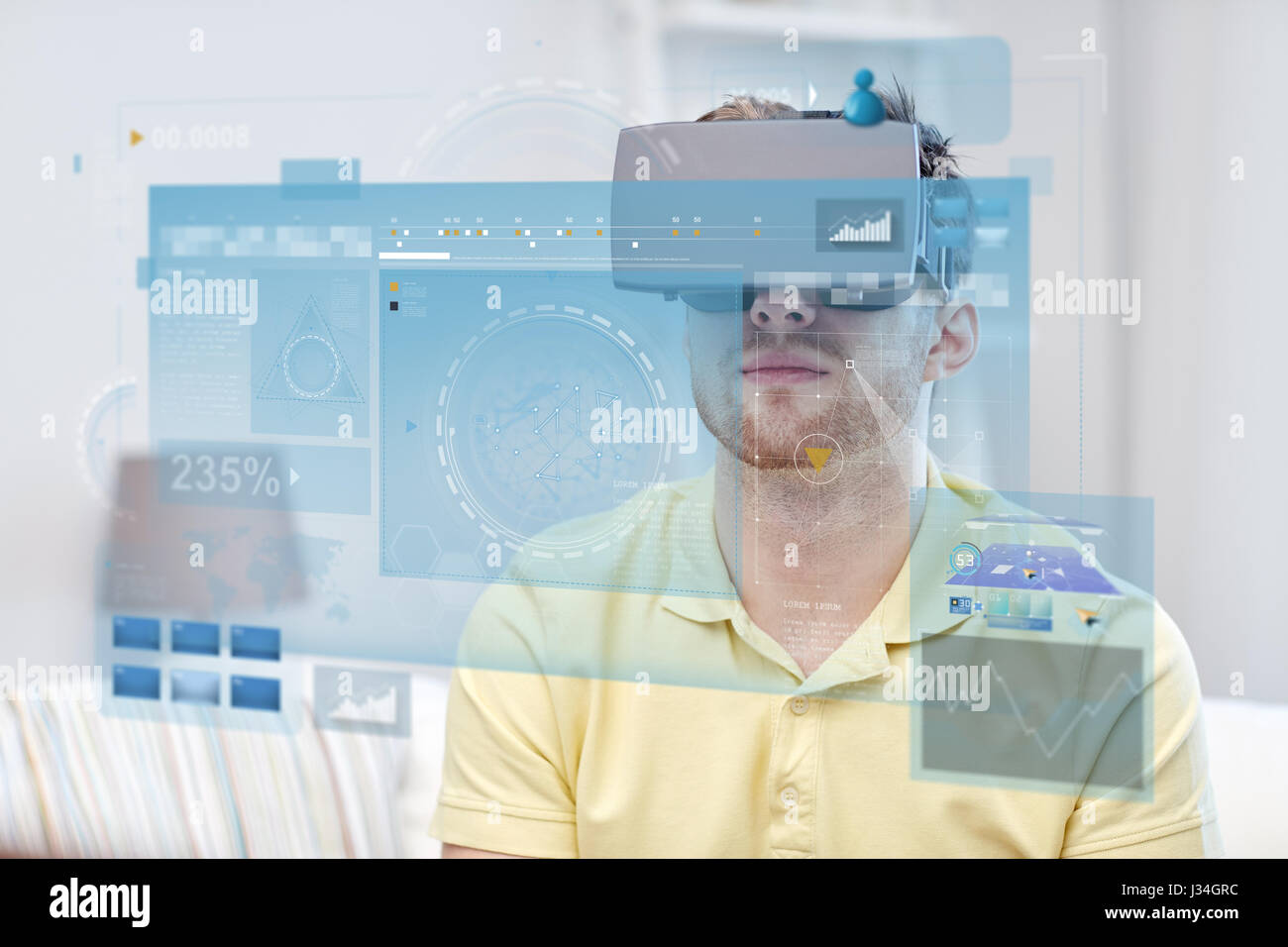 young man in virtual reality headset or 3d glasses Stock Photo - Alamy