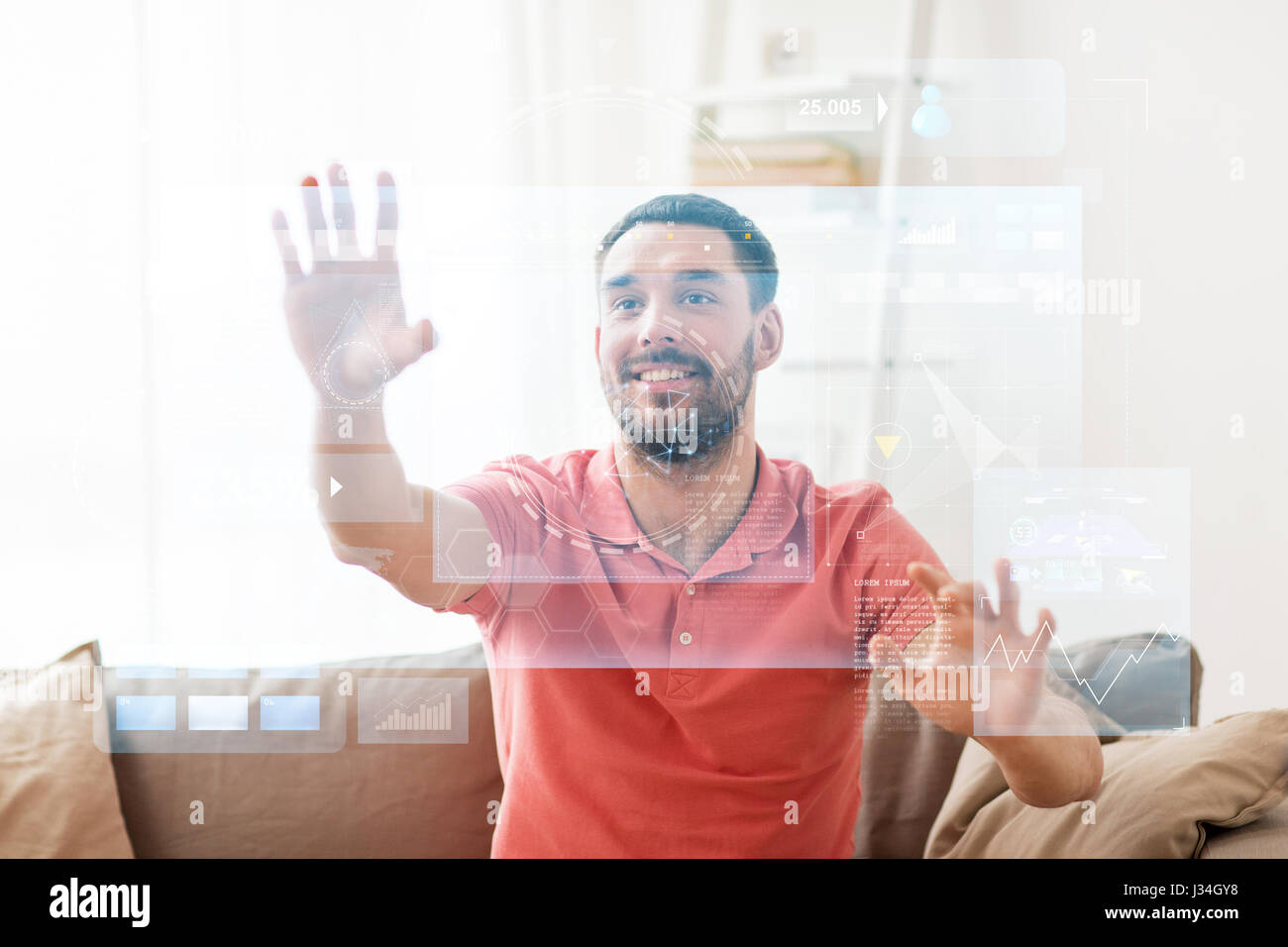 happy man touching virtual screen at home Stock Photo - Alamy