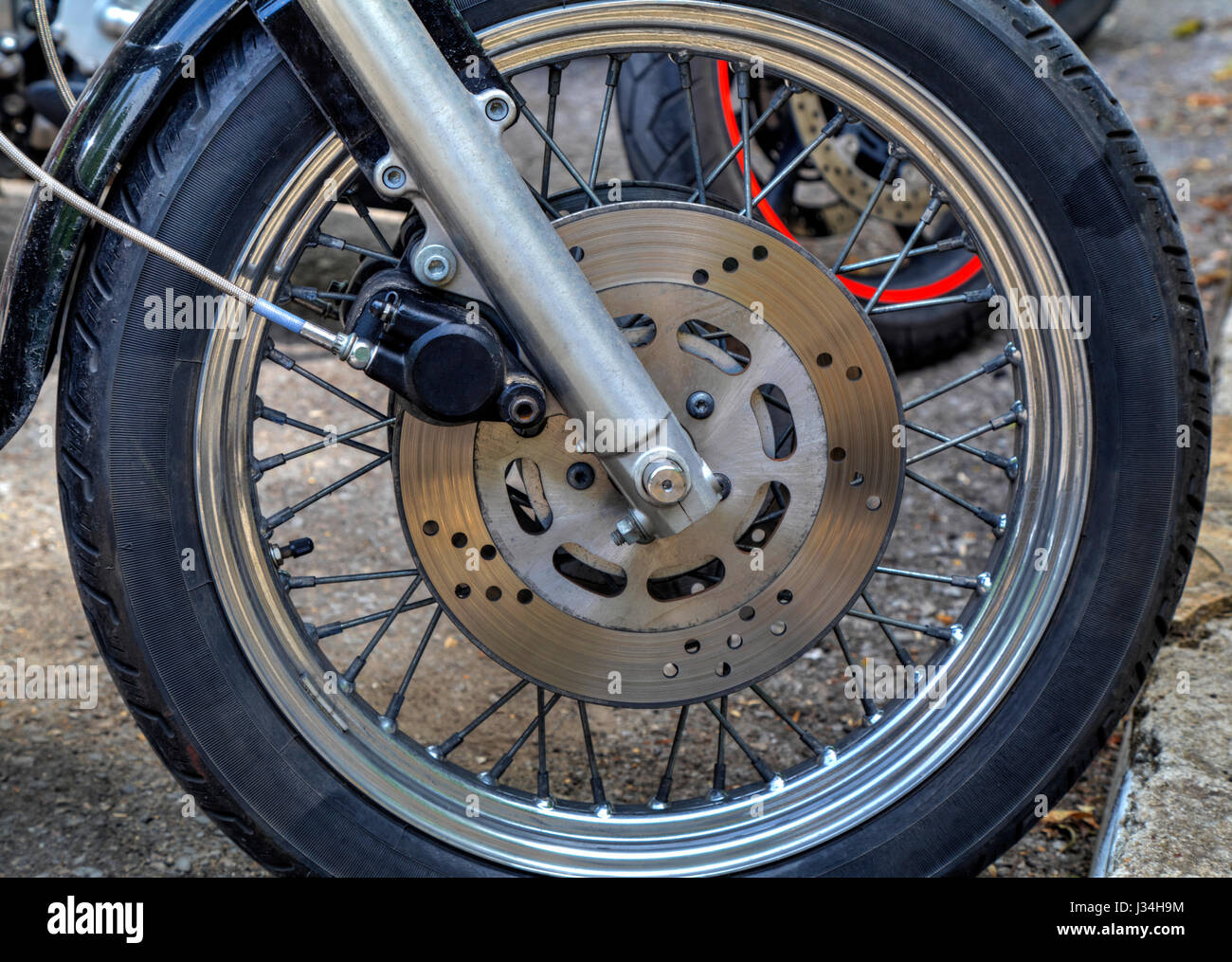 Front motorcycle wheel closeup Stock Photo - Alamy