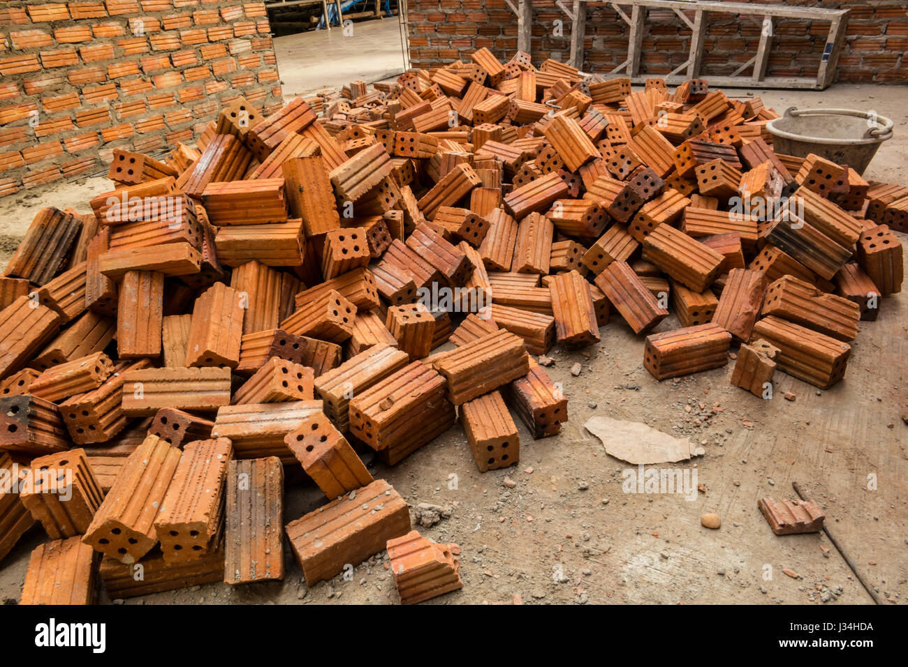 The red brick building for construction site Stock Photo - Alamy
