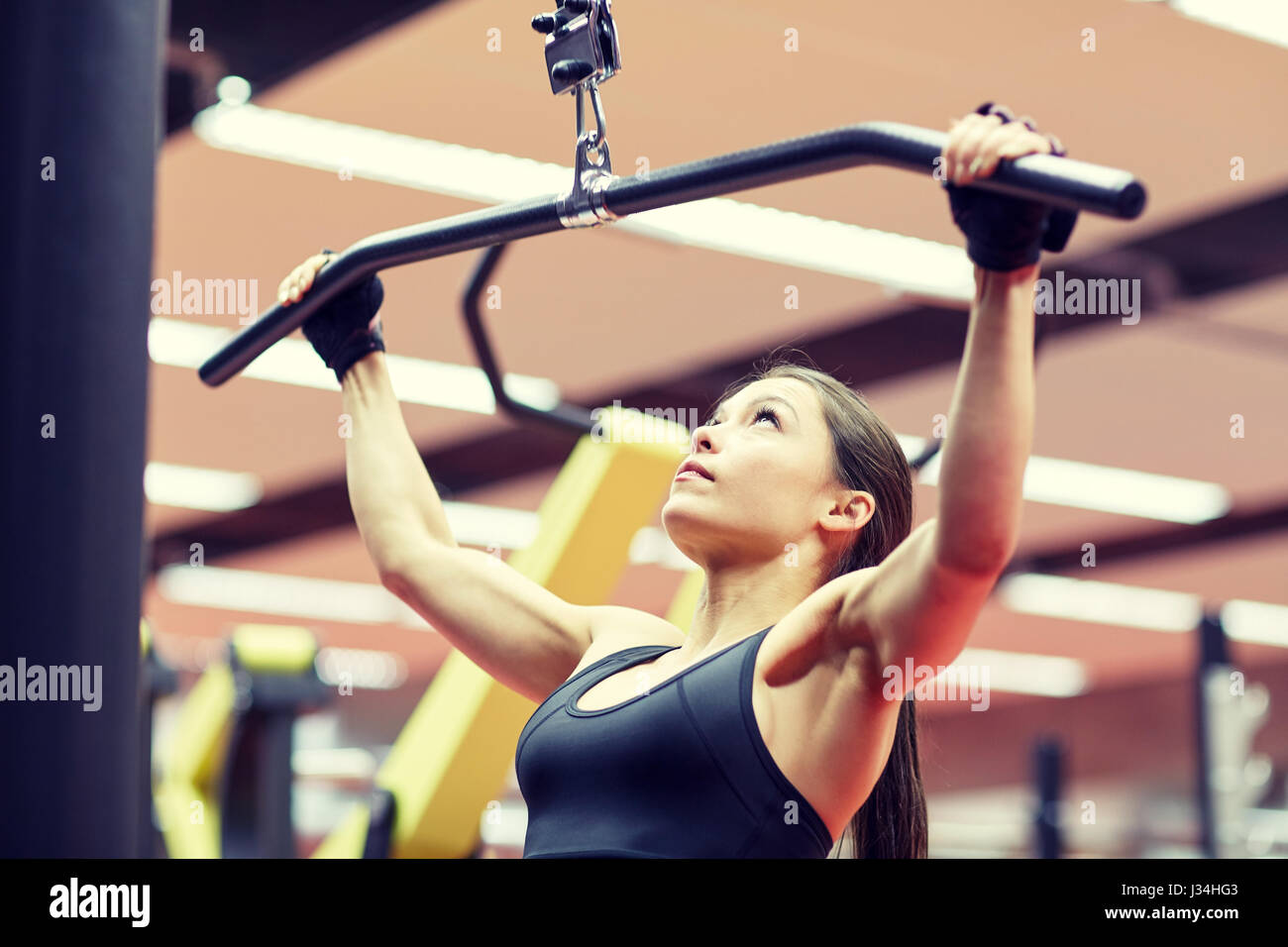Woman flexing arm hi-res stock photography and images - Alamy