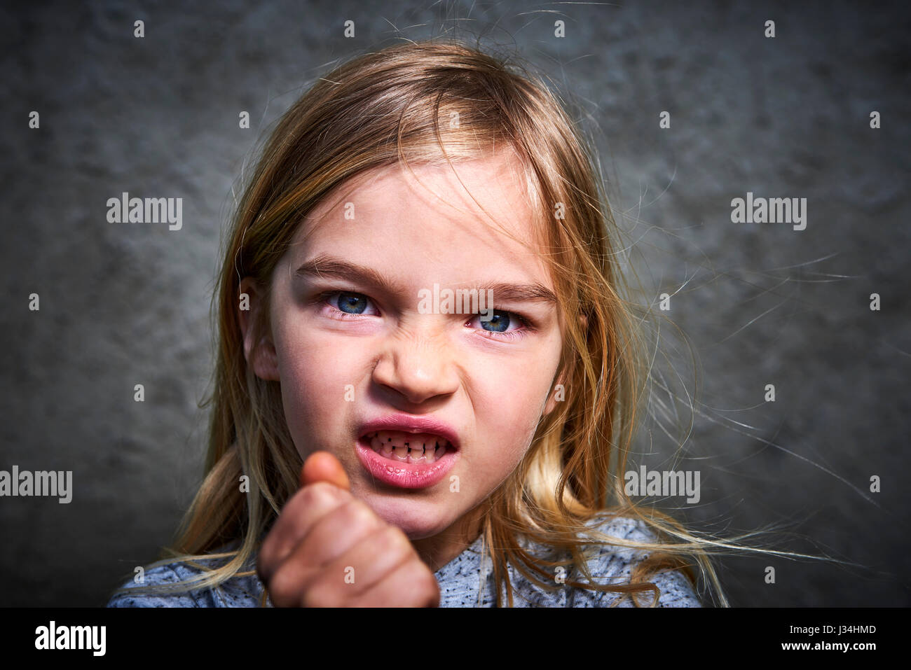 Angry girl child white background hi-res stock photography and images ...