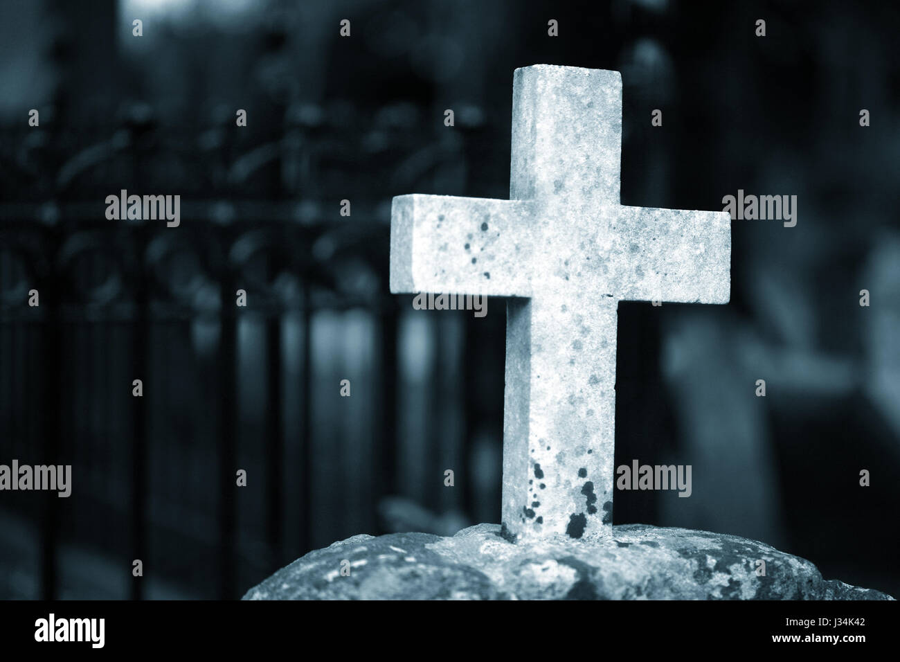 Cross of a tomb in a cemetery in denmark Stock Photo - Alamy