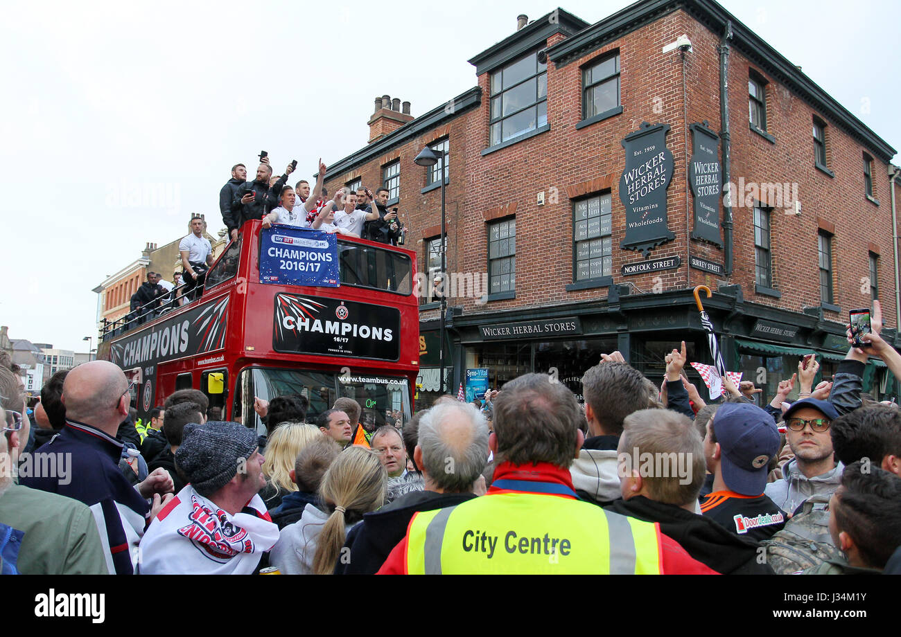 Sheffield United players arrive on an open top bus during the promotion ...