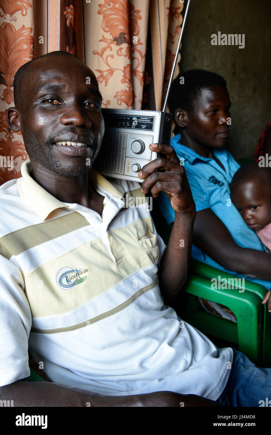 Man and family listen radio hi-res stock photography and images - Alamy