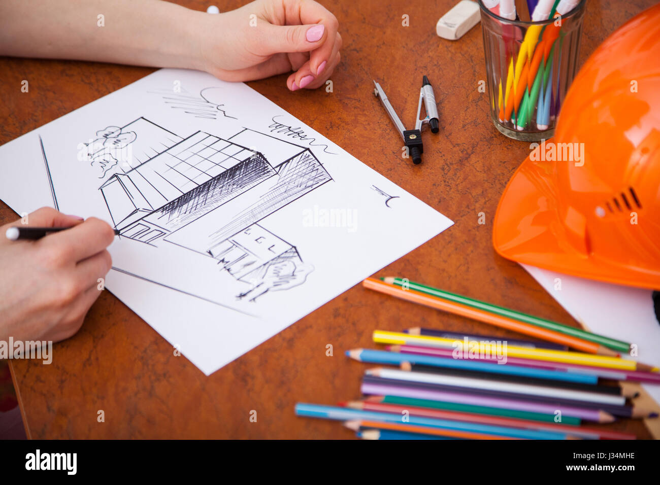 Closeup of drawing building at the desk Stock Photo - Alamy