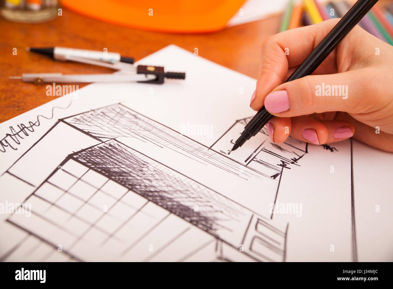 Closeup of drawing building at the desk Stock Photo - Alamy