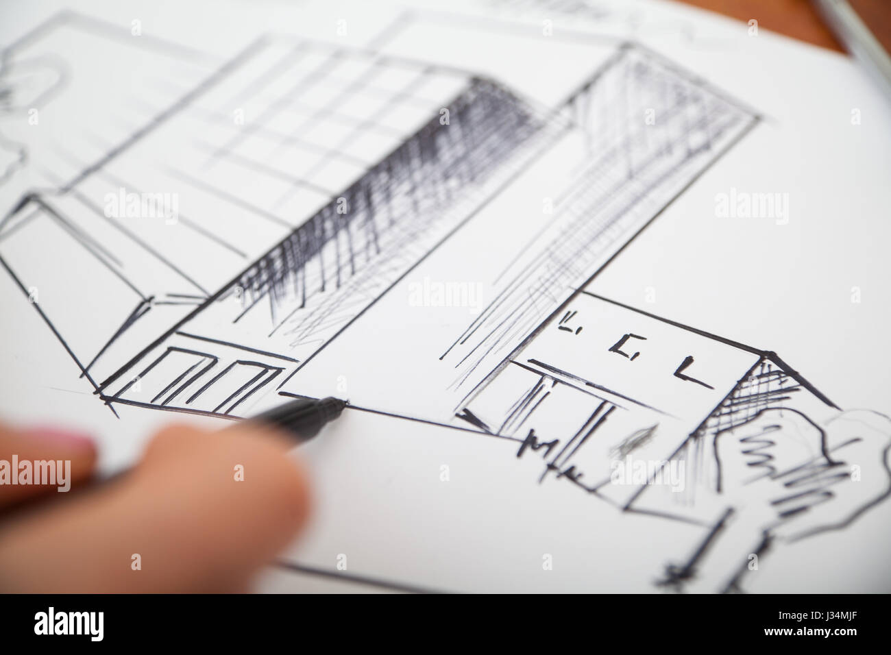Closeup of drawing building at the desk Stock Photo - Alamy