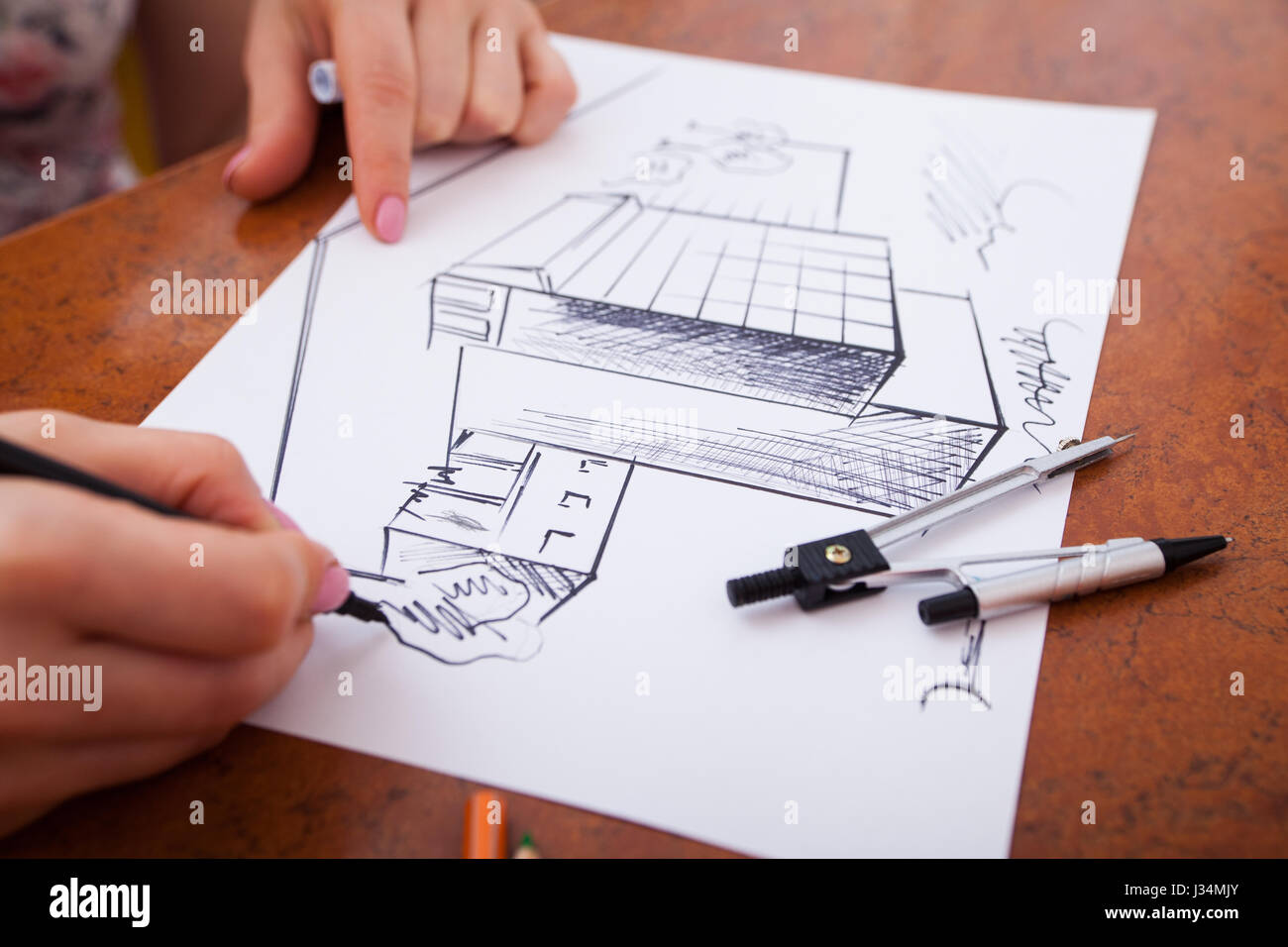 Closeup of drawing building at the desk Stock Photo - Alamy