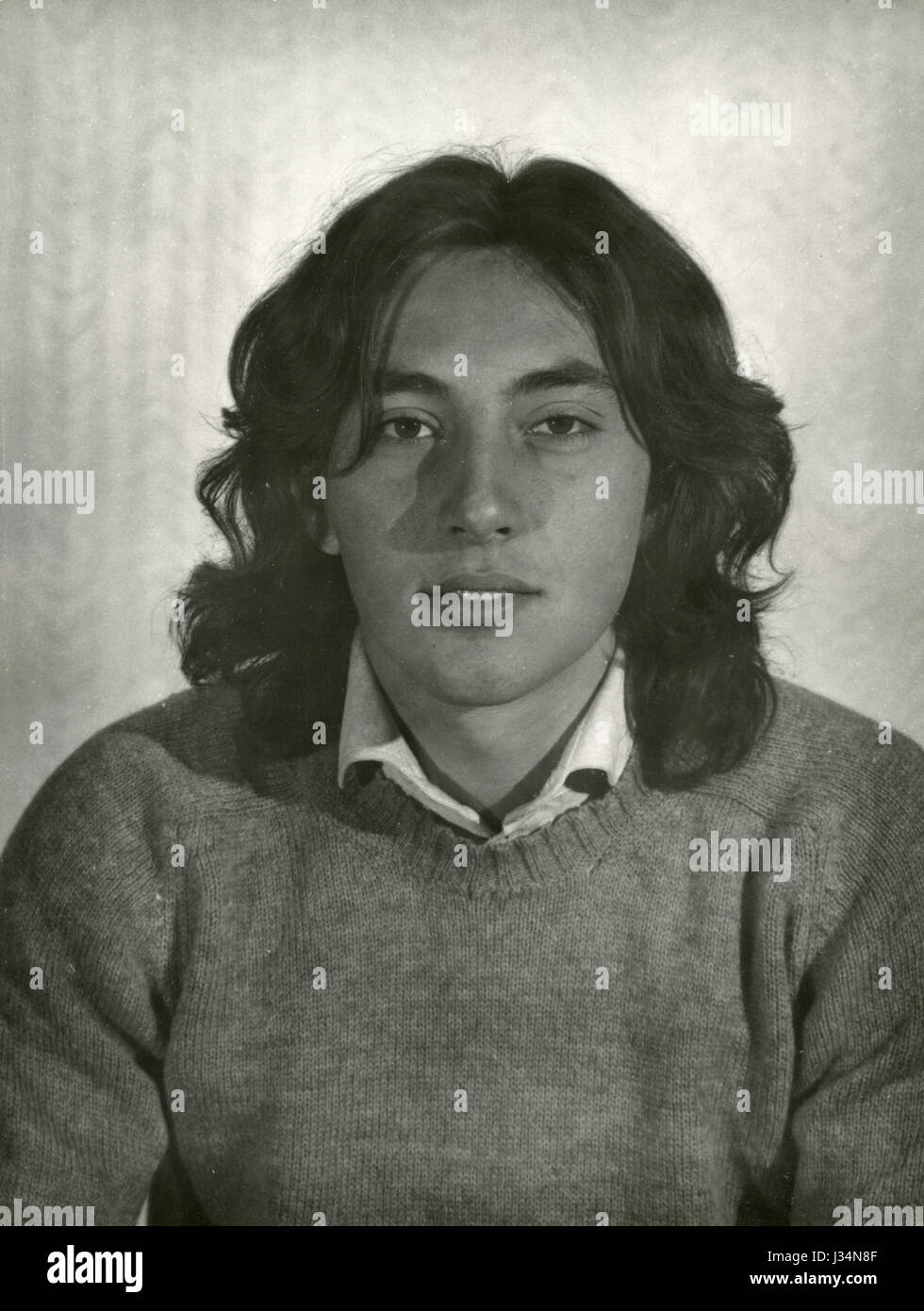 Portrait of a boy with long hair, Italy 1971 Stock Photo - Alamy