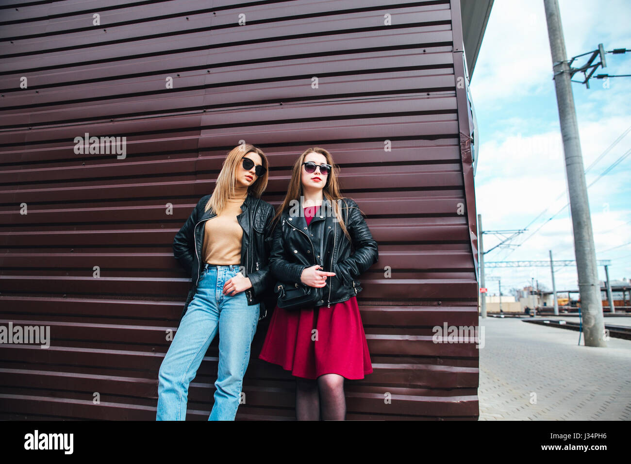 Two Women Talking in the City.Outdoor lifestyle portrait of two best ...