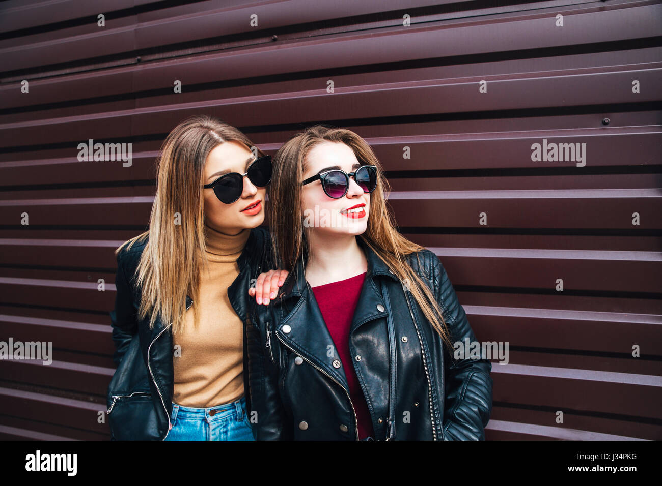 Two Women Talking in the City.Outdoor lifestyle portrait of two best ...