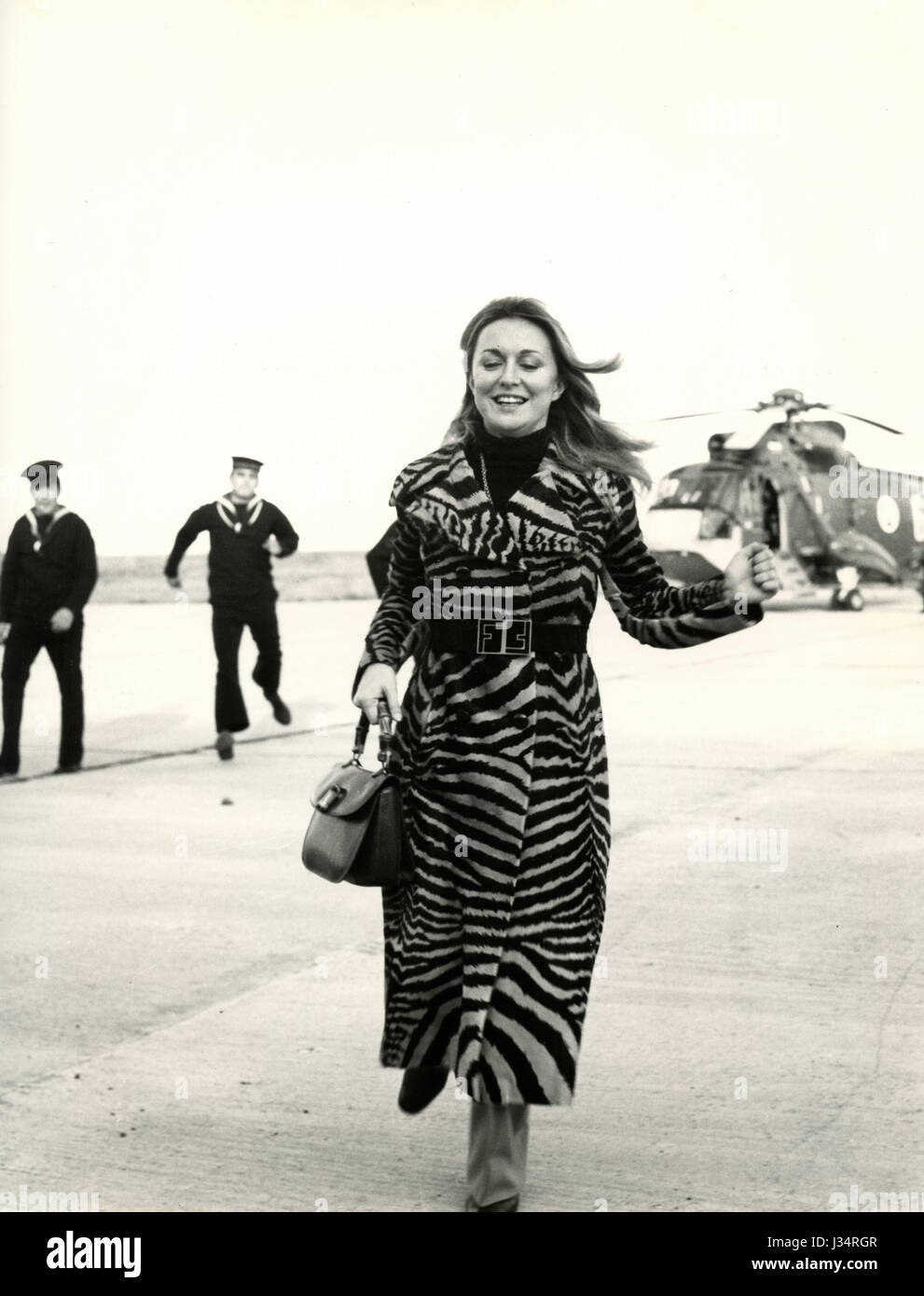 Italian showgirl Paola Piccini with sailors of the Italian Navy Stock ...