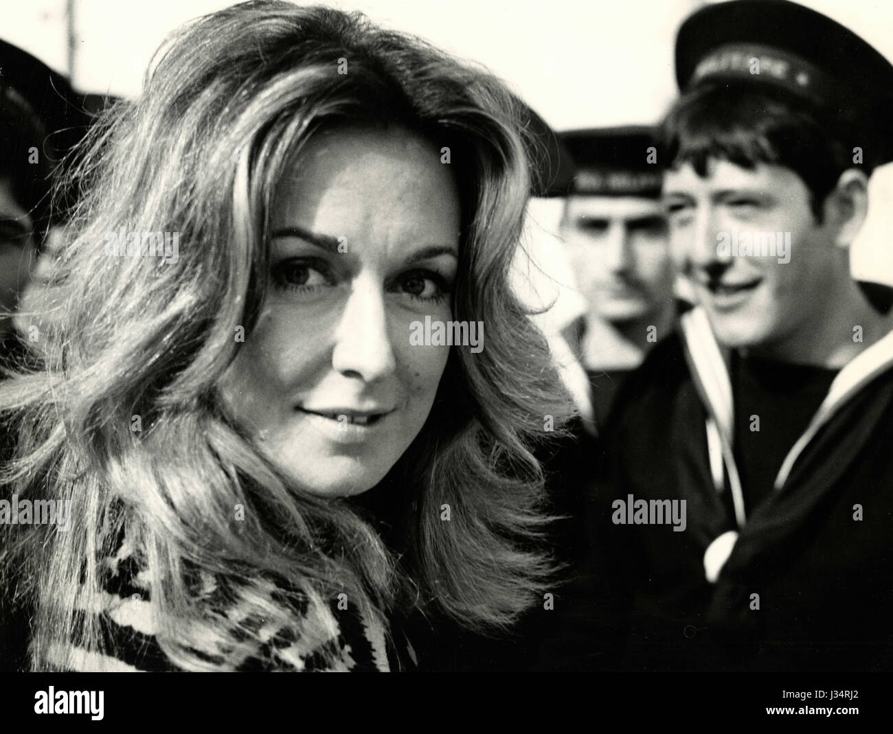 Italian showgirl Paola Piccini with sailors of the Italian Navy Stock ...