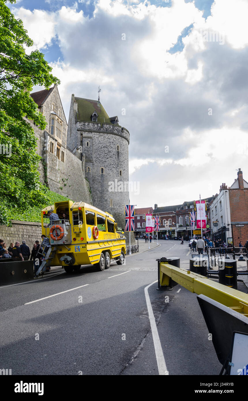 Passengers disembark from an amphibious vehicle outside Windsor Castle ...