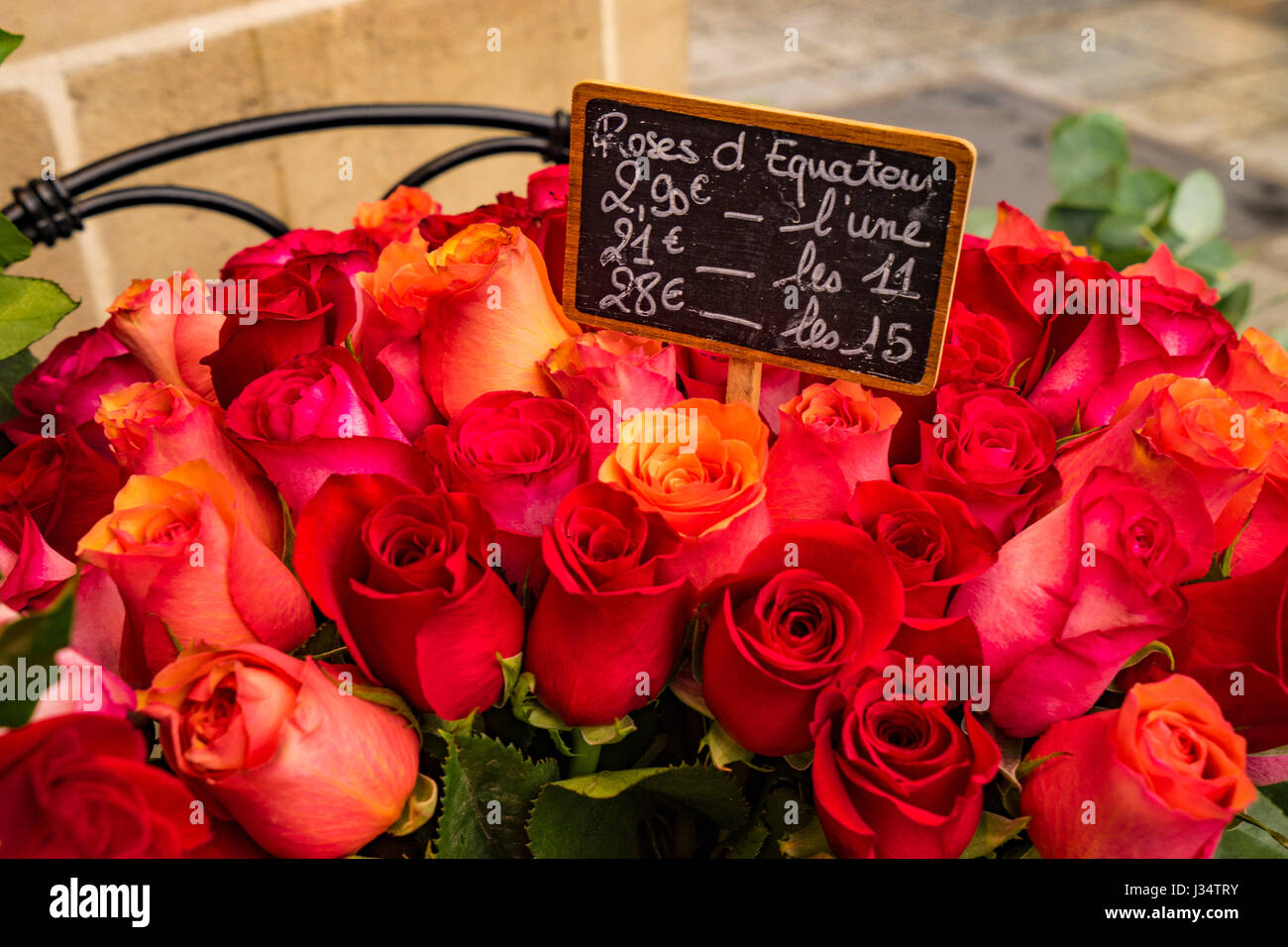 Roses for sale in Paris flower shop with labels displaying euros Stock ...
