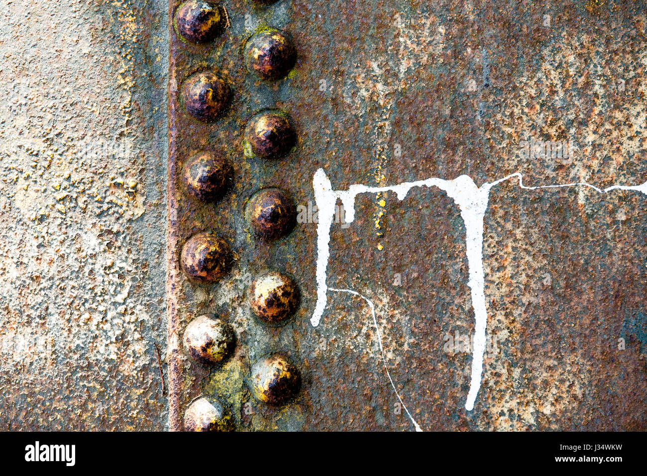 A rusted steel tank with a paint stain Stock Photo - Alamy