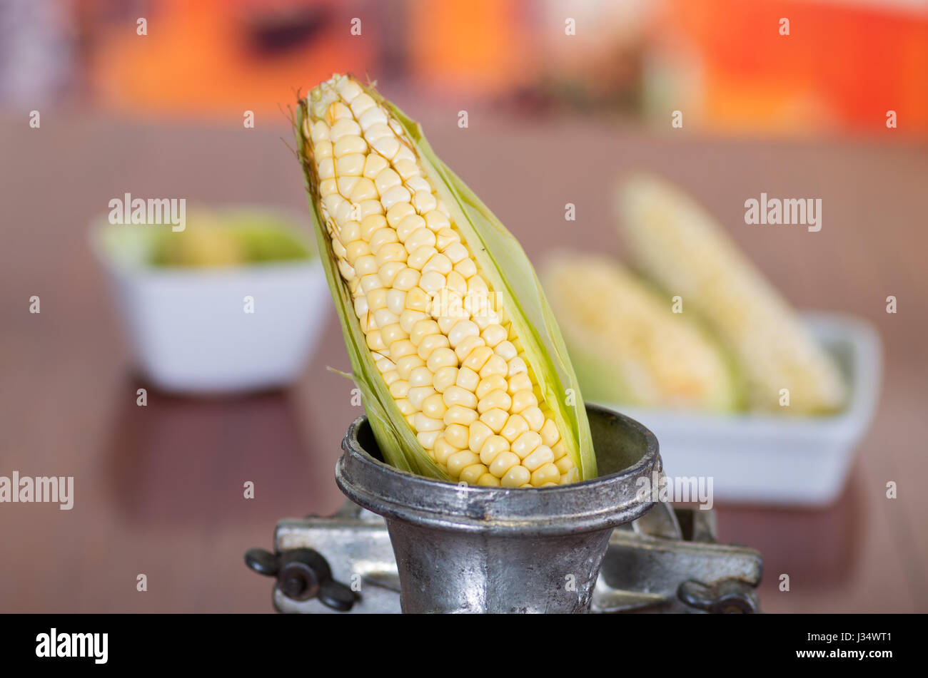 A perfect corn inside of a Mill pretending to be milled Stock Photo - Alamy