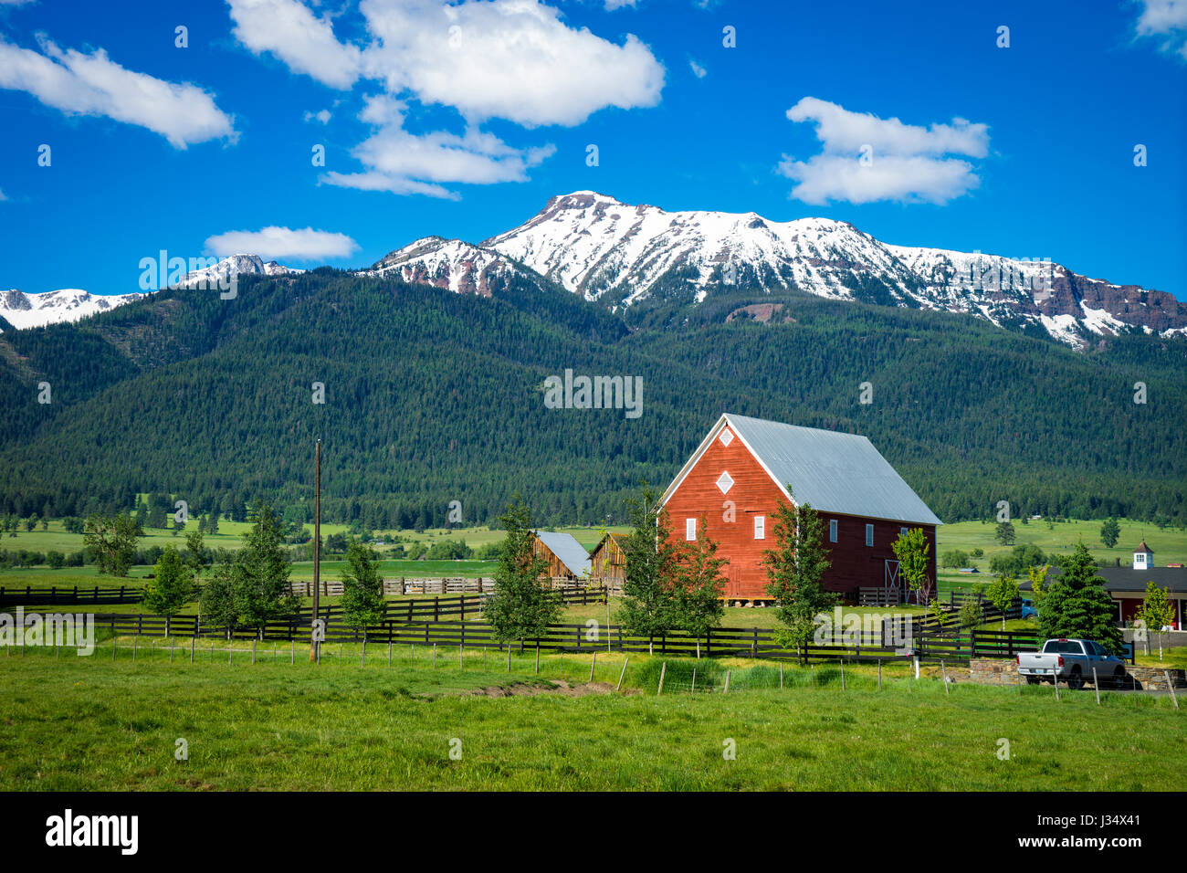 Red barn near Wallowa Mountains in Oregon Stock Photo - Alamy