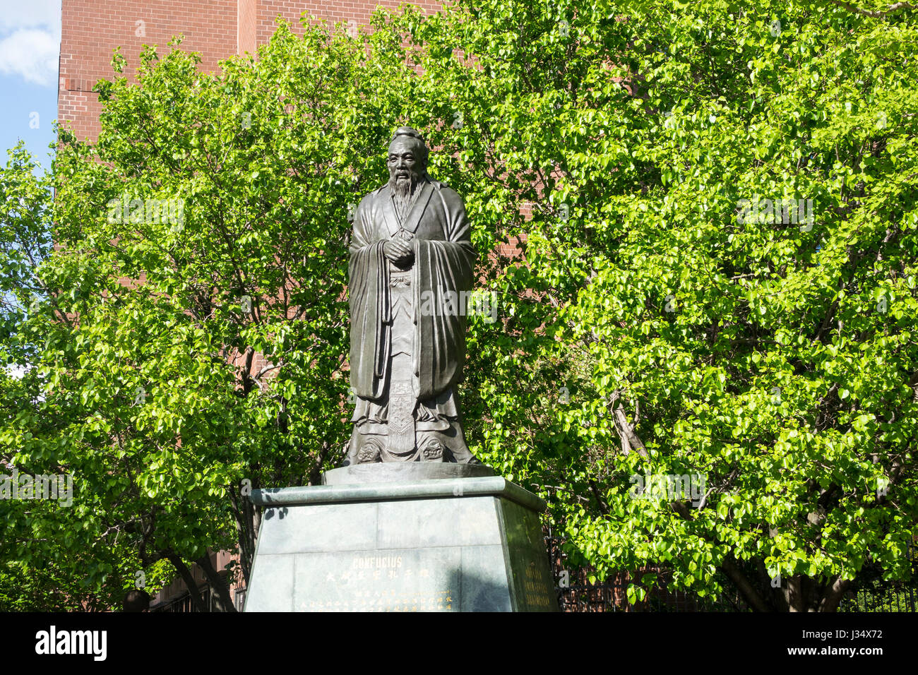Confucius statue in Chinatown, New York city Stock Photo - Alamy