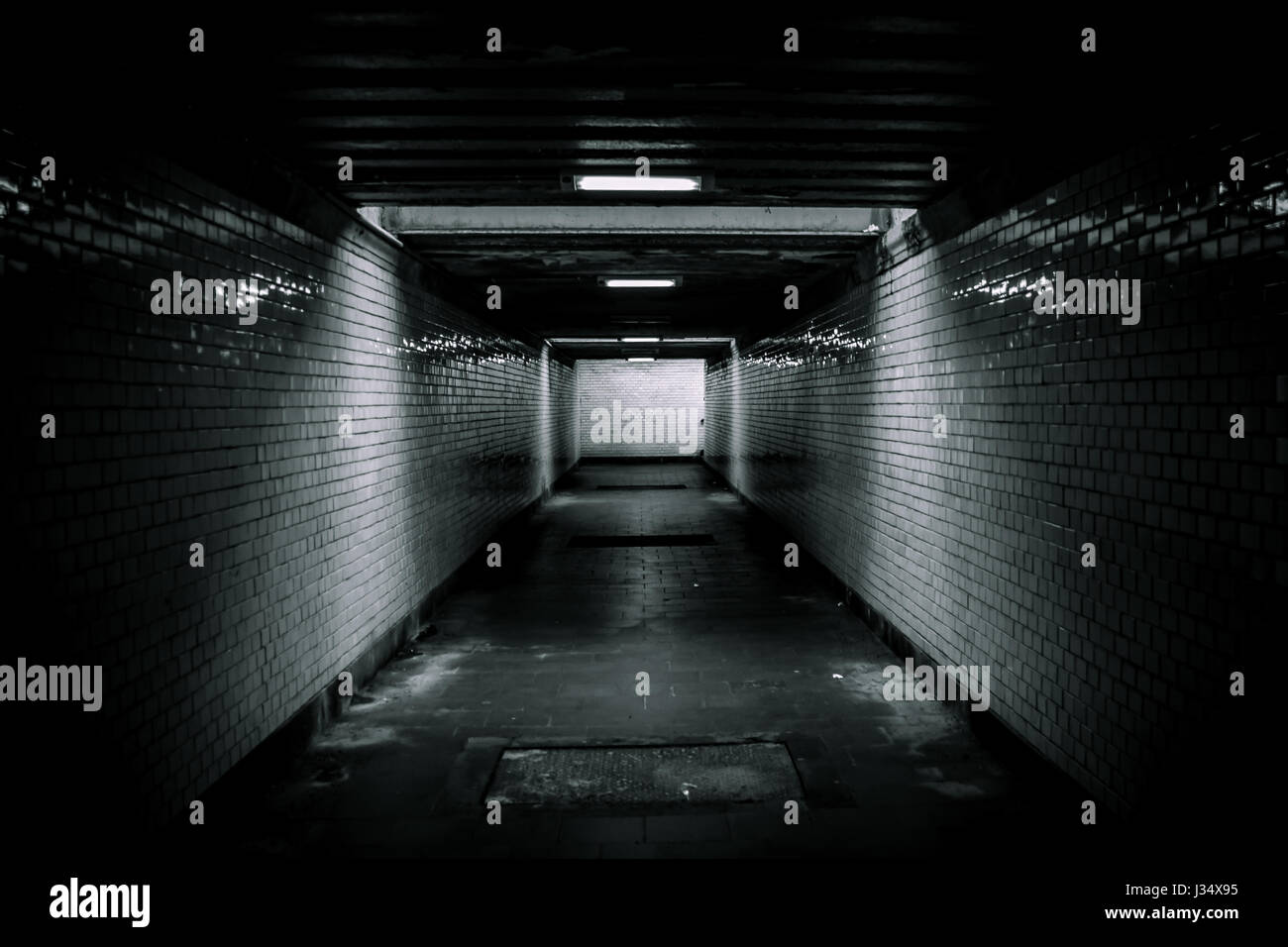 Dark Empty Tunnel - ideal background for a metal band, a creepy horror ...