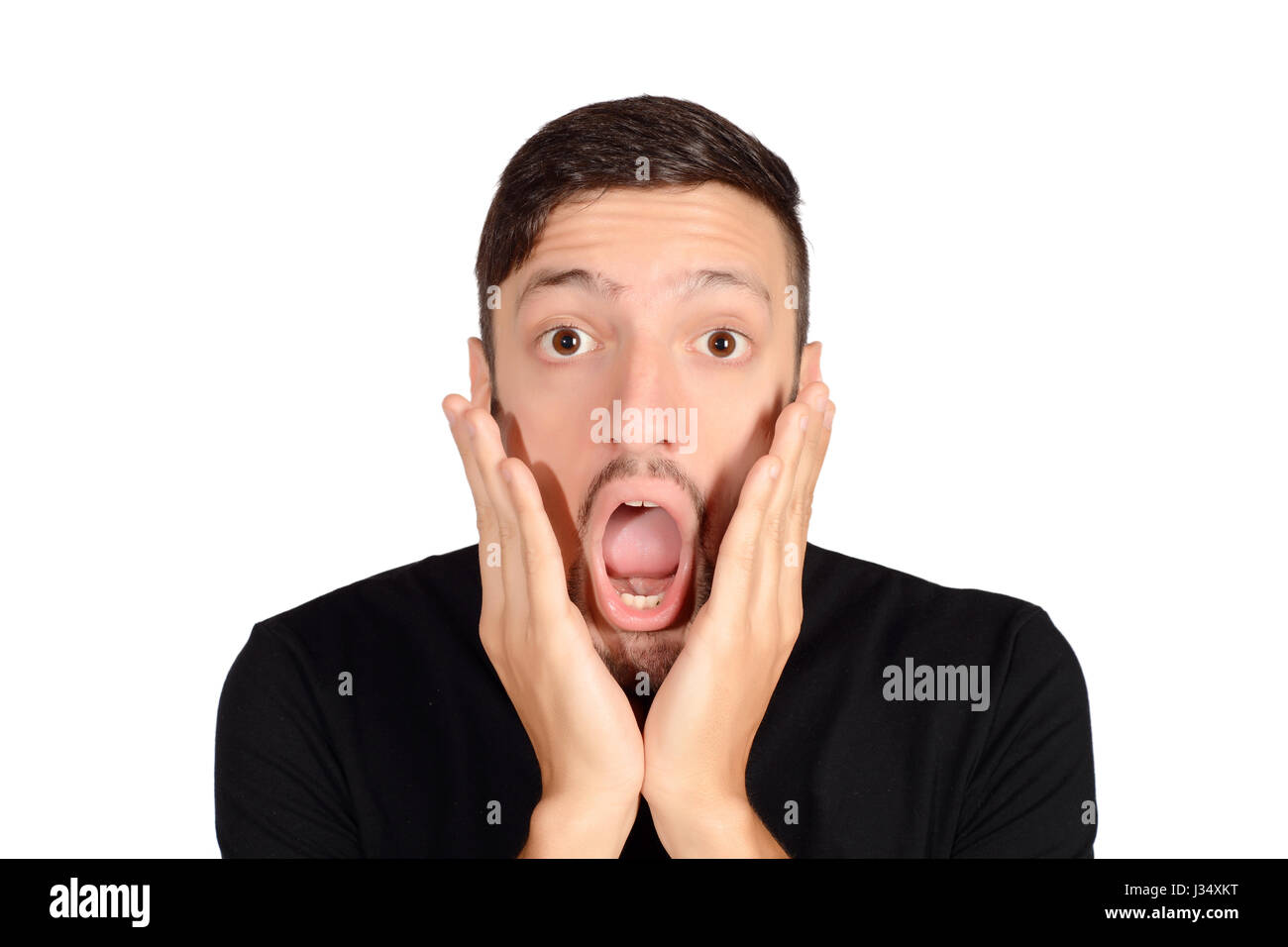 Portrait of a young man shocked. Isolated white background Stock Photo ...