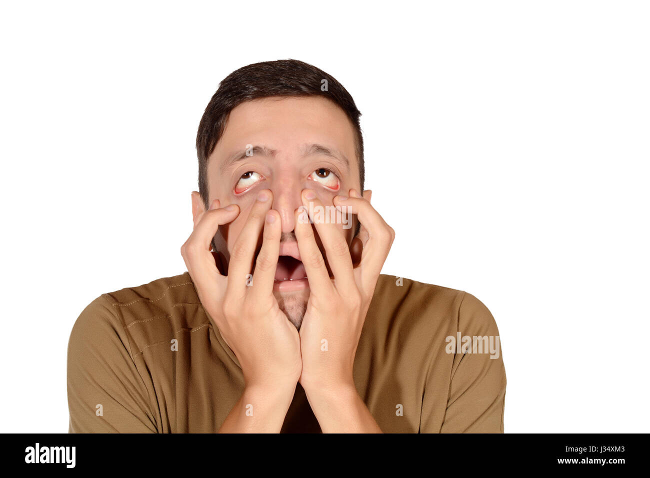 Portrait of an exhausted man. Isolated white background Stock Photo - Alamy