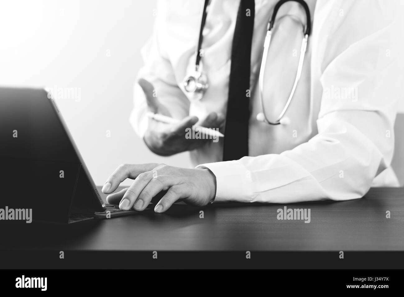 Nurse desk computer Black and White Stock Photos & Images - Alamy