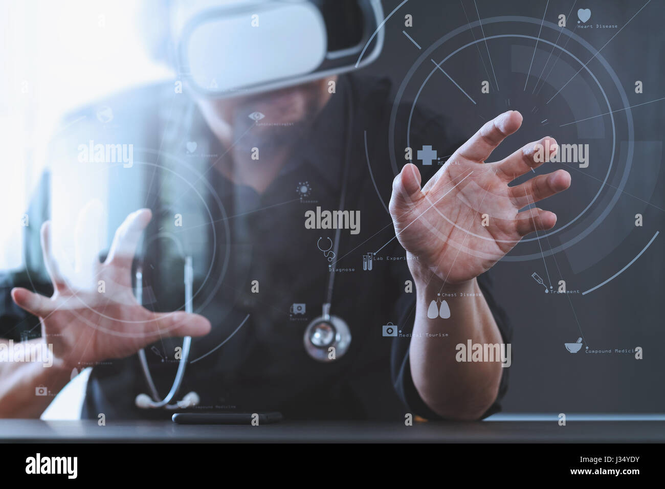 smart doctor wearing virtual reality goggles in modern office with ...