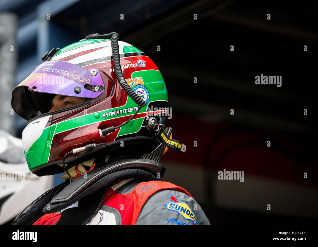 Ryan Ratcliffe getting out of his car during a pit stop driver change ...