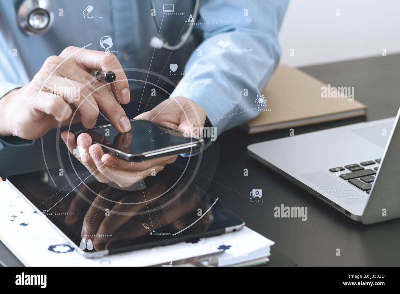 smart medical doctor working with mobile phone and stethoscope and ...