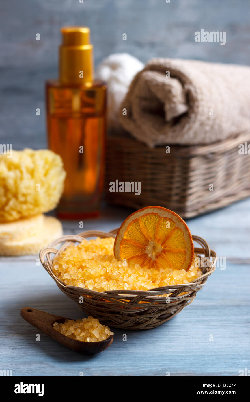Orange Spa and wellness setting and health care items on blue ...