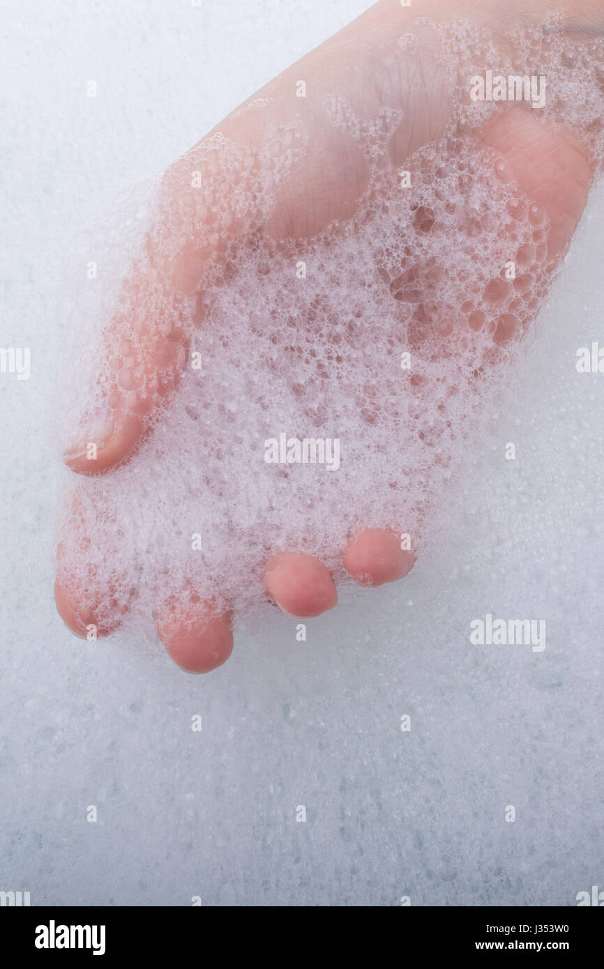Hand washing and soap foam on a foamy background Stock Photo - Alamy