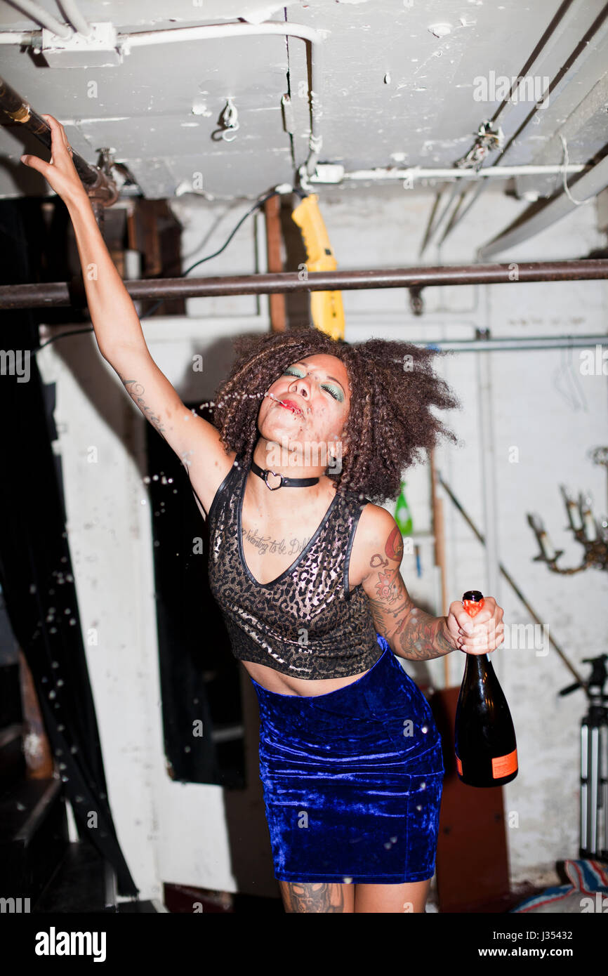 Young woman dancing backstage Stock Photo - Alamy