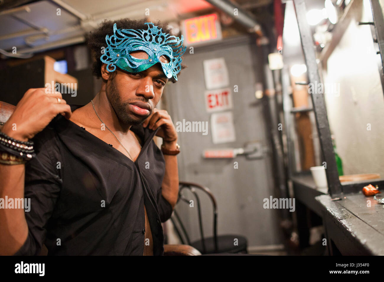 Young actor preparing backstage at a theater Stock Photo - Alamy