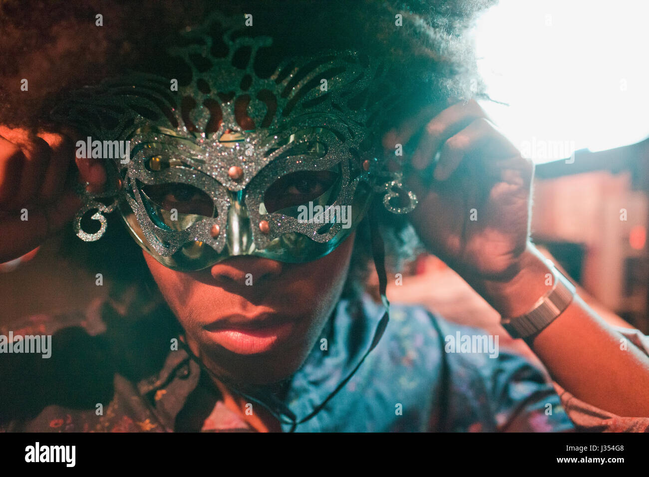 Portrait of a young actor wearing a mask Stock Photo - Alamy