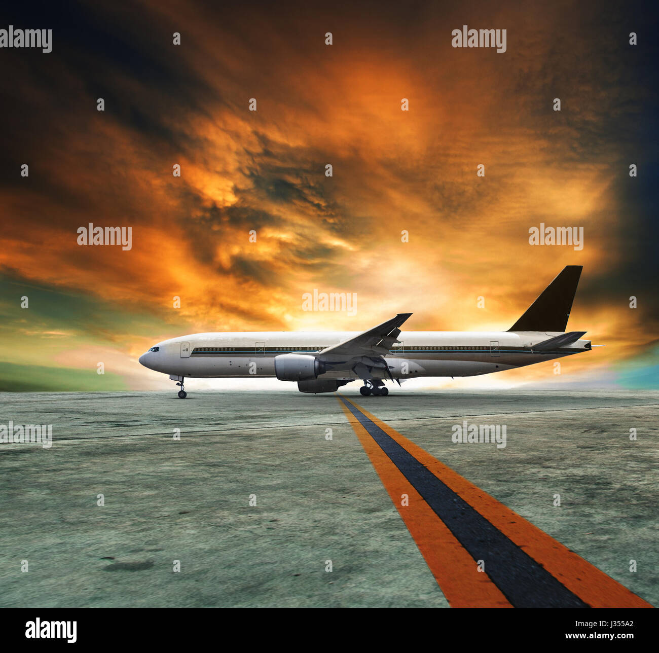 jet plane flying over runways and beautiful dusky sky with copy space ...