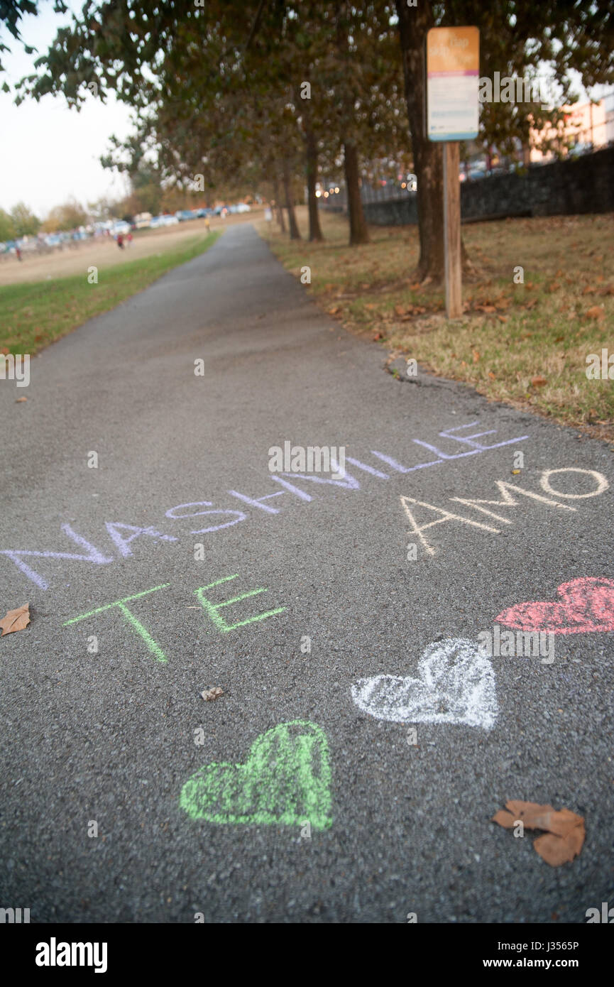 Chalk writing on the pavement at Coleman Park in Nashville that says ...