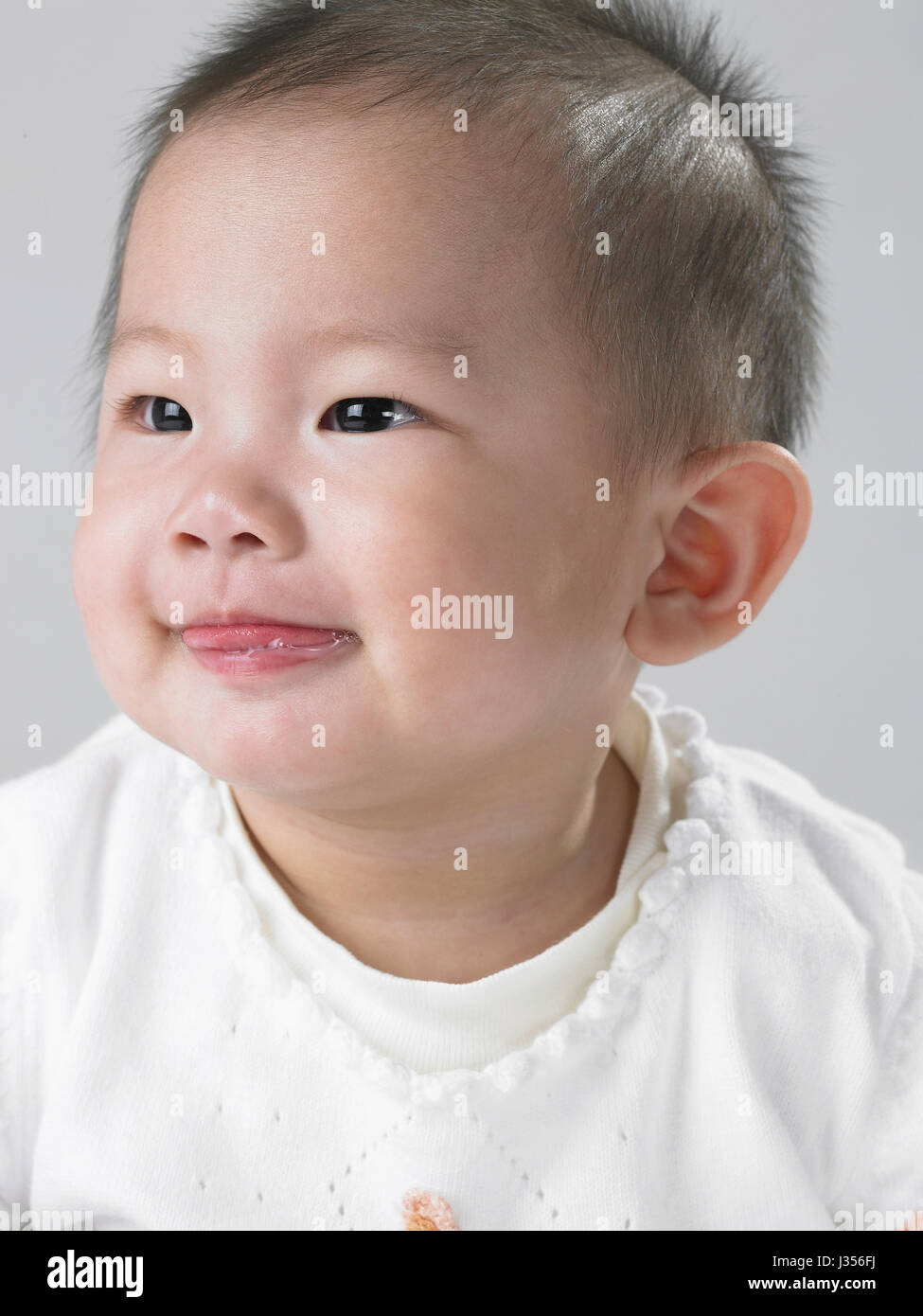 Head shot chinese baby smiling hi-res stock photography and images - Alamy