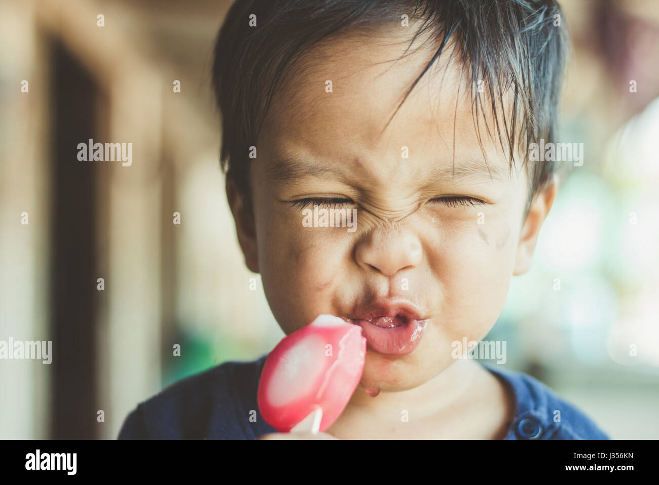 Kids eat ice cream happily and fun Stock Photo - Alamy