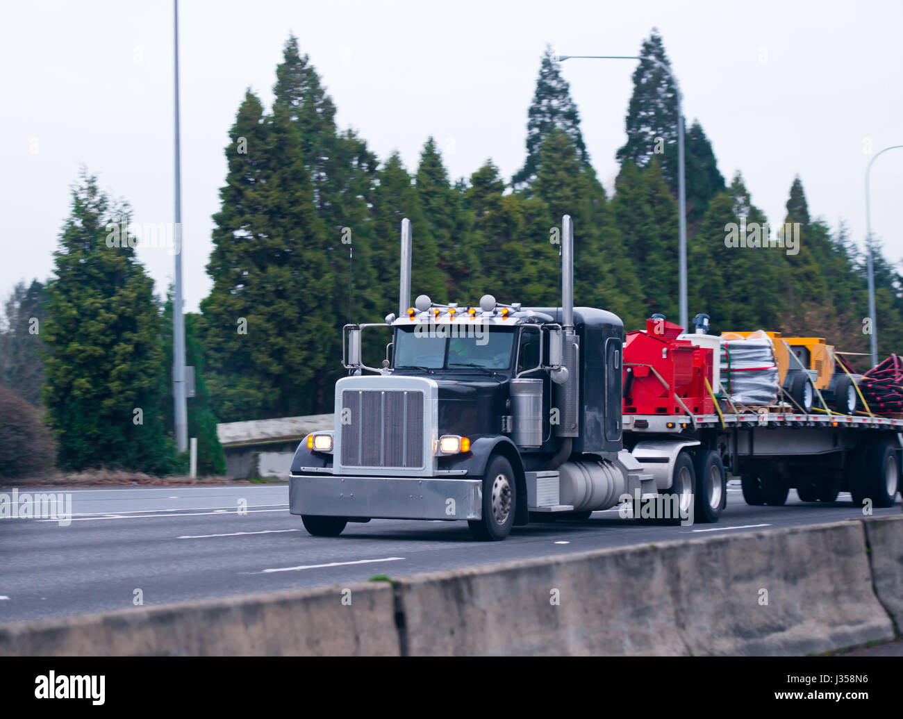 Large classic American powerful bonnetedbig rig semi truck for long ...