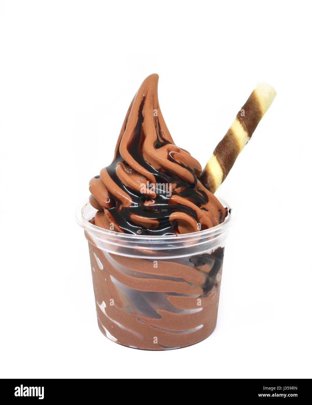 soft serve ice cream in a cup with topping Stock Photo - Alamy