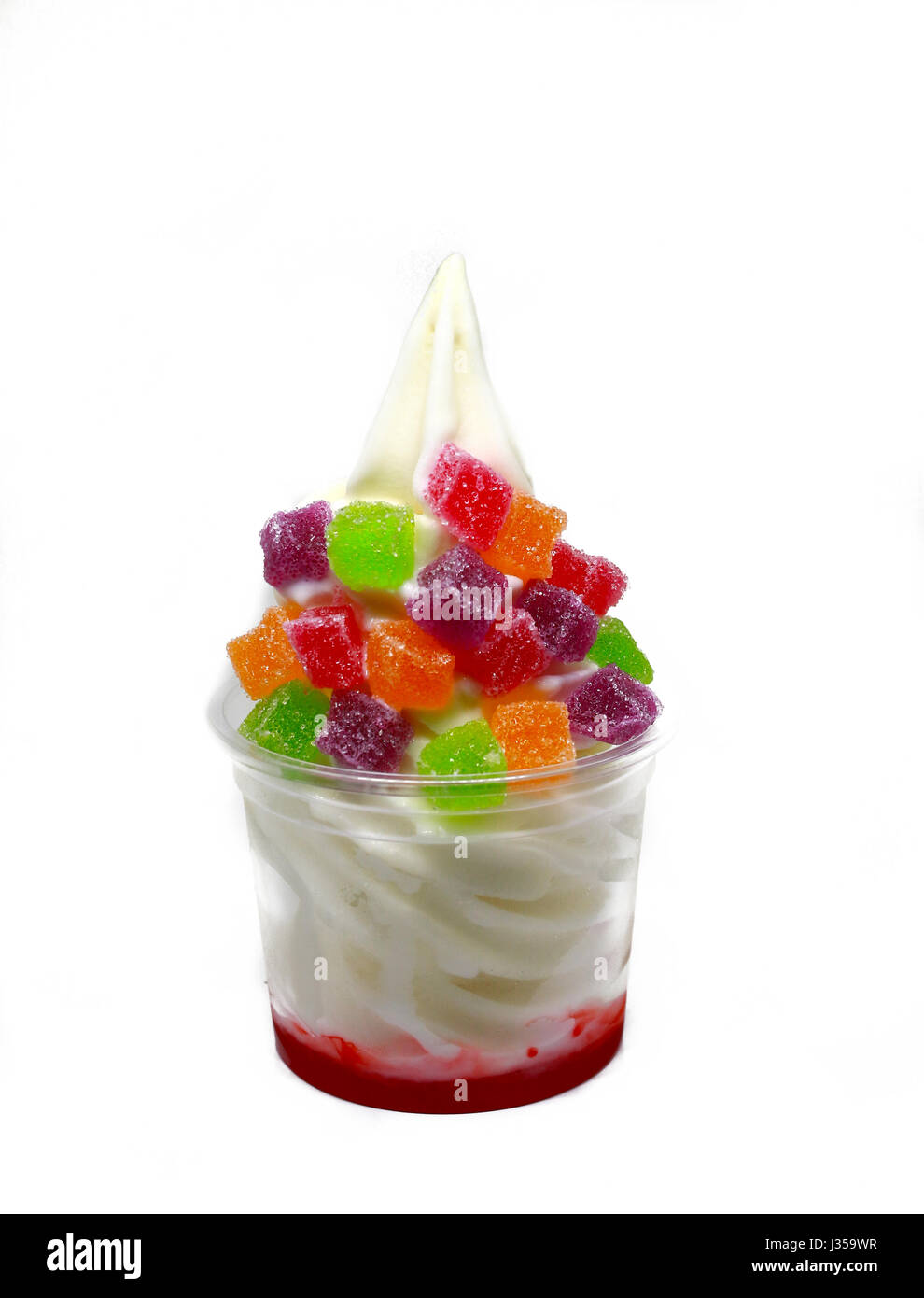 soft serve ice cream in a cup with topping Stock Photo - Alamy