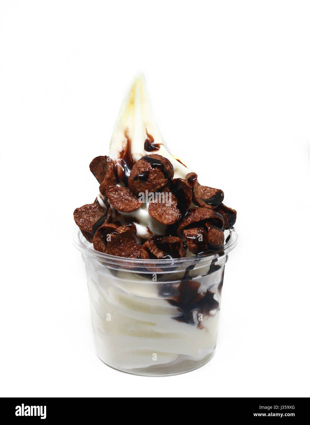 soft serve ice cream in a cup with topping Stock Photo - Alamy