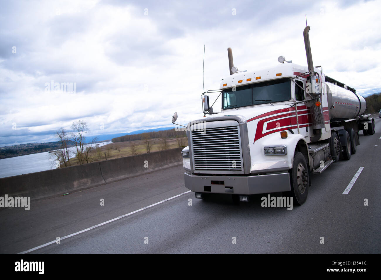 Classic American big rig semi truck with high exhaust pipes ...