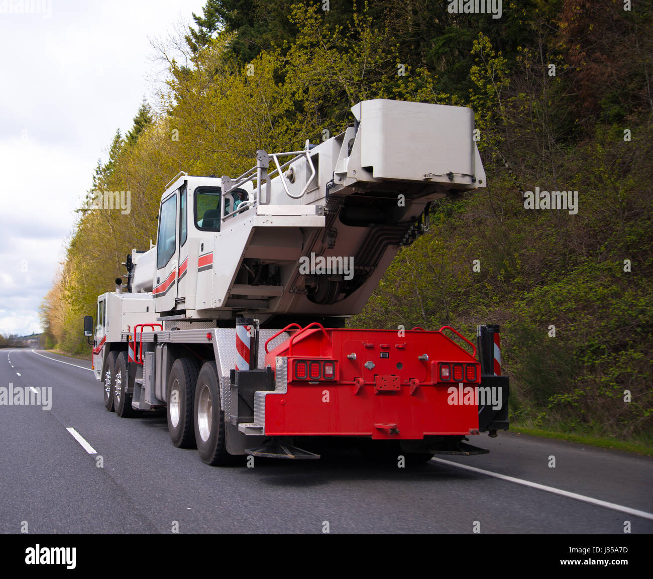 A huge powerful mobile self-propelled wheeled crane with extendable ...