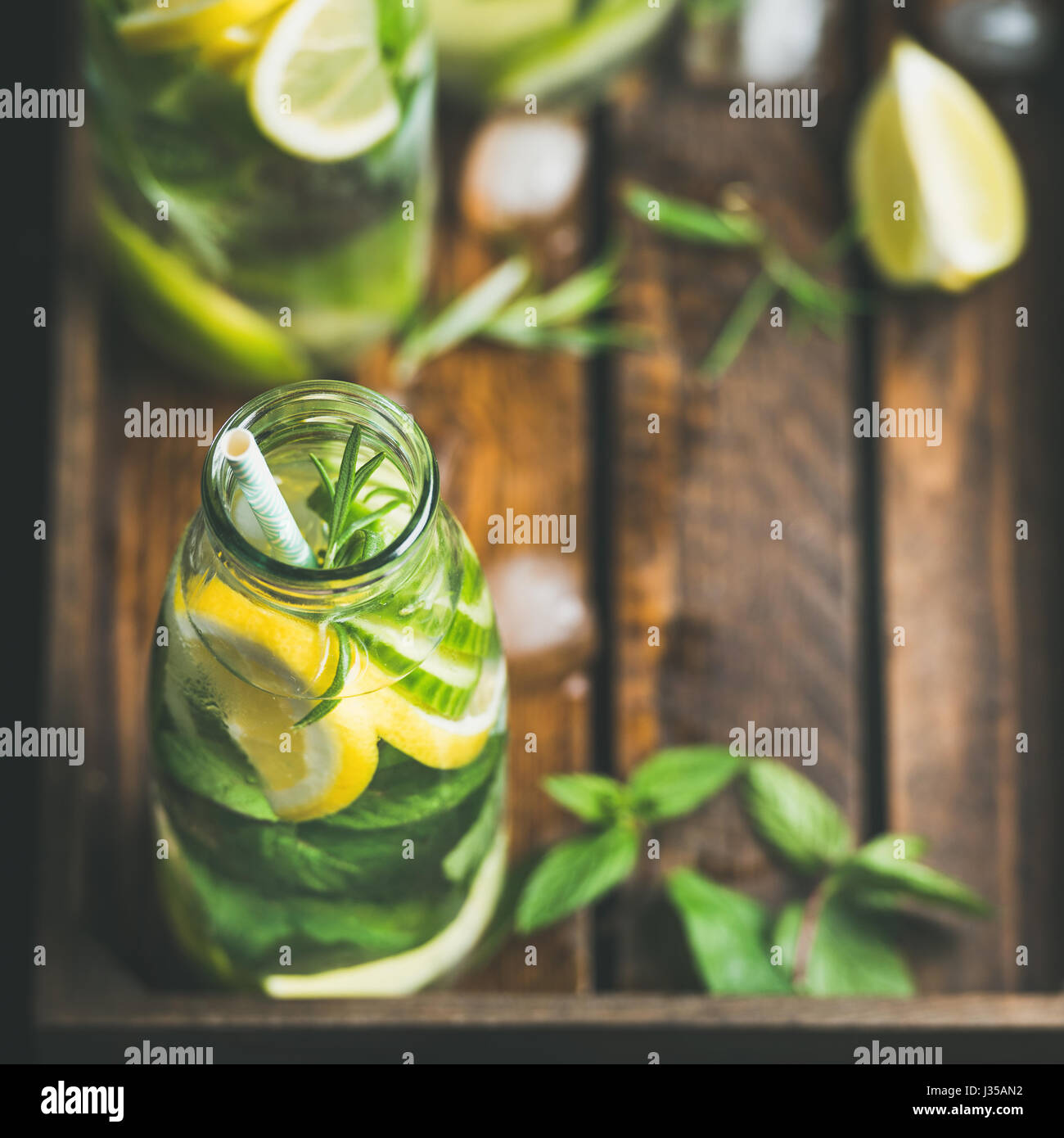 Citrus fruit and herbs infused sassi water for dieting Stock Photo - Alamy