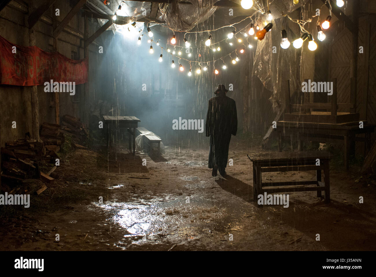 Man in raincoat rain hat hi-res stock photography and images - Alamy